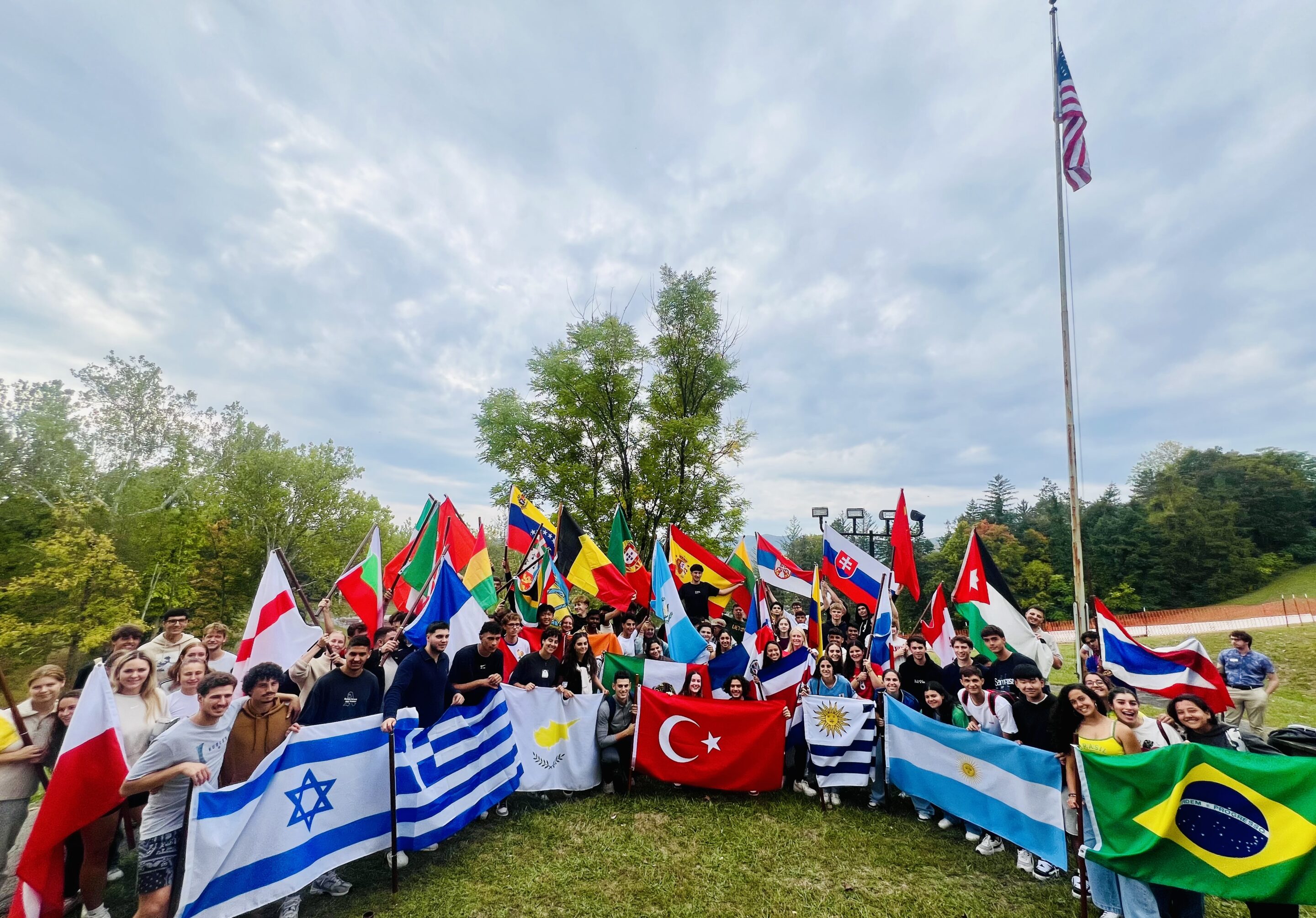 Davis & Elkins College students raise the flag of their country for the ...
